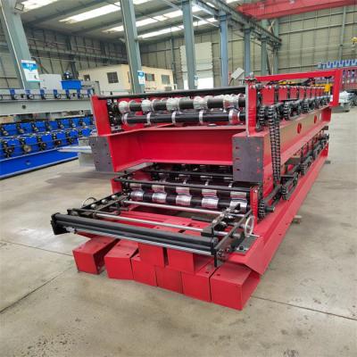 China Galvalume trapezoidal sheet roll forming machine automatic rib roll forming machine for sale