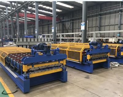 China Rolo de aço do painel do telhado do ferro que forma o ibr de corte hidráulico da máquina que faz a máquina à venda