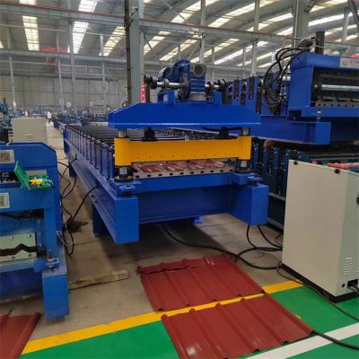 China Casted pintado metal galvanizou o rolo do painel do telhado de 840 Ibr que forma a máquina para materiais de construção à venda
