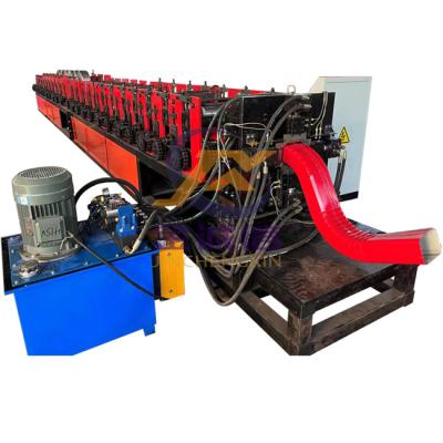 Cina tetto Ridge Cap Roll Forming Machine dell'incanalamento 12-15m/min per la discesa di colata d'acciaio in vendita