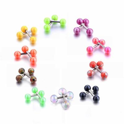 China La bola doble de los pendientes del perno prisionero del color del caramelo echó a un lado los pendientes para la joyería del oído de las mujeres en venta