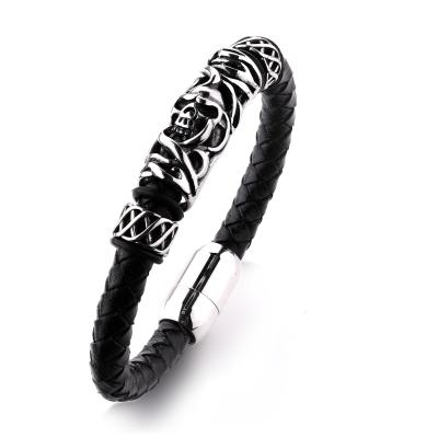 China El negro barato del precio plateó la pulsera del norte del cráneo de los hombres del cuero del negro del encanto del metal del cráneo para la venta al por mayor en venta