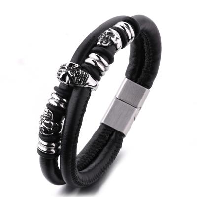 China Pulseras esqueléticas de alta calidad del cuero del negro de la venta al por mayor de la joyería del vintage de los hombres de la pulsera del cráneo del acero inoxidable en venta