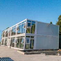 China Online Technical Support Prefab House Cabin Sandwich Panel Flat Pack Container House for sale