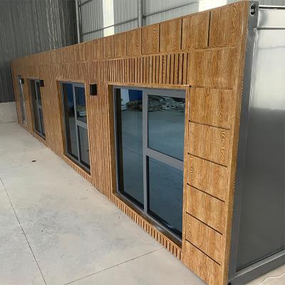 China Casa de contêineres pré-fabricada de 40FT com painéis solares Casa modular de design moderno à prova de furacão à venda