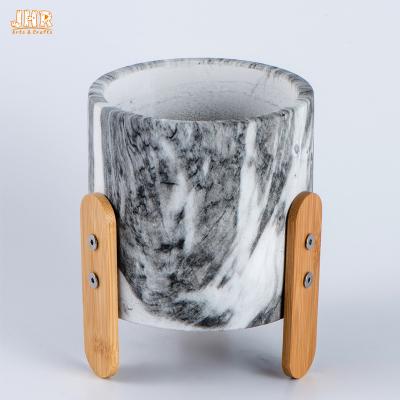 中国 大理石模様をつけることはタケ フィートの小型鍋が付いている植木鉢のSucculentsの鍋プランターのあたりのセメントの植物の鍋を織る 販売のため