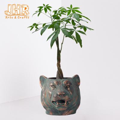 中国 44x40x38cmの粘土の植木鉢は青銅色の植物のライオンの彫像の卓上プランターをAntique 販売のため
