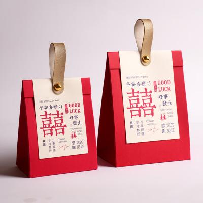 China Custom candy box creative wedding candy packaging box candy gift box empty box candy bag with hand gift for sale
