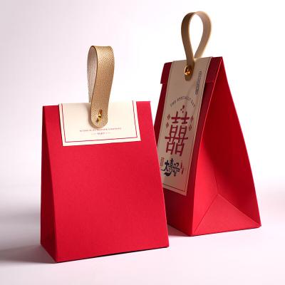 China Custom candy box creative wedding candy packaging box candy gift box empty box candy bag with hand gift for sale