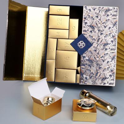 China Customized high-end gilded Christmas arrival countdown calendar blind box empty box cosmetic skincare packaging box for sale
