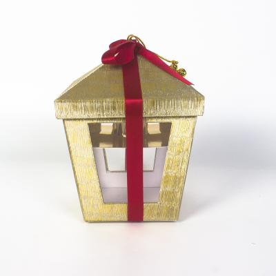 中国 カスタマイズされた絶妙な天および地球カバー贅沢なギフト用の箱の赤いリボンのクリスマスのプレゼント包装箱 販売のため