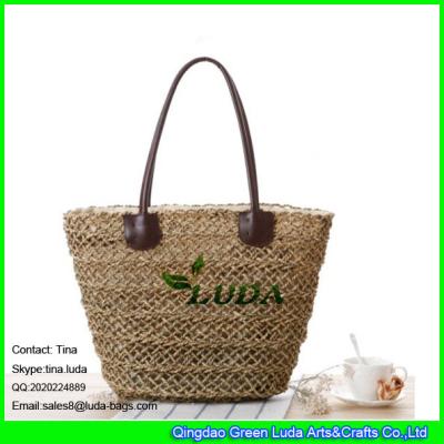 China LUDA hollow out lady handbag natural sea plant weave straw tote bag for sale