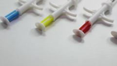 Animal ID tag with syringe