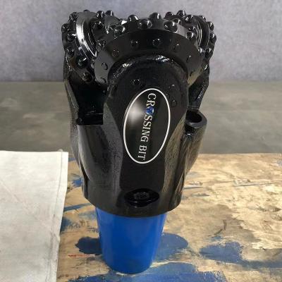 China Taxa de perfuração rápida Serrada Dente Roller Cone Bit Borracha Rolamento selado à venda