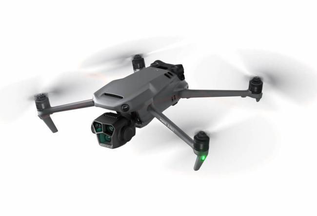 Mavic 3 Pro drone in flight showing obstacle avoidance sensors