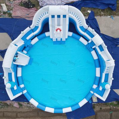 China Max Capacity 100-500kg Large Snow Kingdom Inflatable Water Park with Pool and Slides for sale