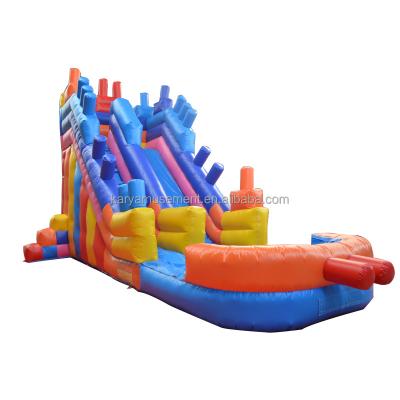 China 2023 Customized Outdoor Inflatables PVC Colorful Building Blocks Air Jumping Slide for sale
