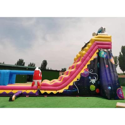 China Temática de astronauta comercial piscina inflable con tobogán de agua enorme y rocket largo tobogán en venta