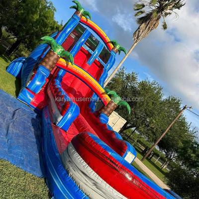 China Verlengde dubbele glijbaan Rode opwindende opblaasbare combo springkasteel voor waterpark Te koop