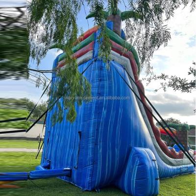 China Verlengde dubbele glijbaan Rode opwindende opblaasbare combo springkasteel voor waterpark Te koop