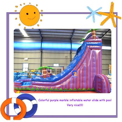China Commercial Inflatable Pool Slides with Colorful Palm Purple Marble Jumping Slide for sale