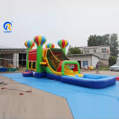 China Kids' PVC tarpaulin inflatable castle slide set with colorful balloons and bounce house for sale