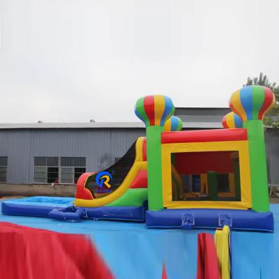China Kids' PVC tarpaulin inflatable castle slide set with colorful balloons and bounce house for sale