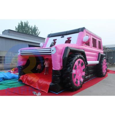 China Pink Inflatable Jeep Castle Slide Combination Bouncer SUV Jumping Castle with Blower for sale