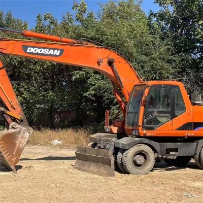 Cina Prezzo basso 22 tonnellate usato escavatore a ruote coreano Doosan DX 210W-7 con ore di lavoro più basse in vendita