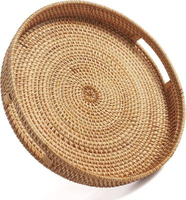 China 2024 New arrival Round Rattan Serving Tray Decorative Woven Ottoman Trays with Handles for Coffee Table Natural color for sale