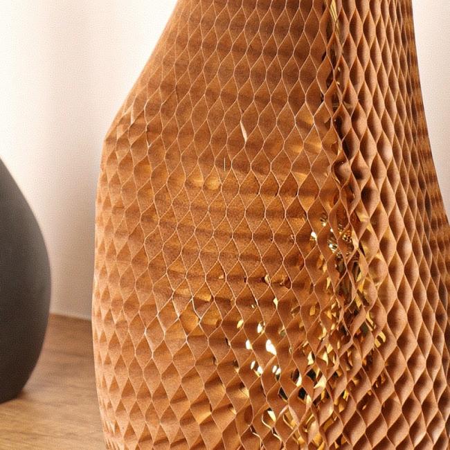 Honeycomb paper sleeve application on framed artwork
