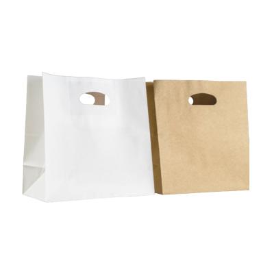 China Die‑Cut Handle Kraft Paper Bag – 80‑140gsm, Cut‑Out Handle for Easy Carrying for sale