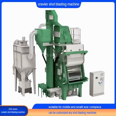 中国 Tumble Rubber Belt Shot Blasting Machine with Variable Speed Blast Wheel Customized 販売のため