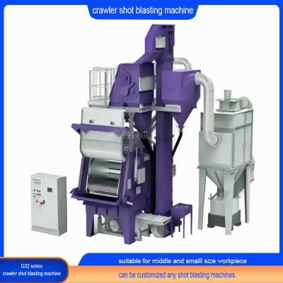 中国 Tumble Rubber Belt Shot Blasting Machine with Variable Speed Blast Wheel Customized 販売のため