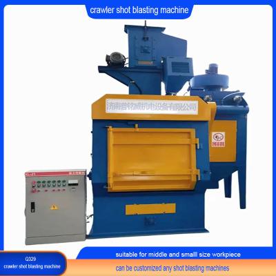 中国 Tumble Rubber Belt Shot Blasting Machine with Variable Speed Blast Wheel Customized 販売のため