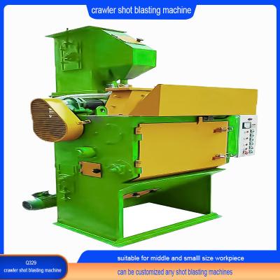 中国 Tumble Rubber Belt Shot Blasting Machine with Variable Speed Blast Wheel Customized 販売のため