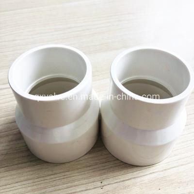 Cina ASTM Sch40 Accoppiamento riduttore in PVC per tubi di approvvigionamento idrico Fittings QX 1-1/4 clienti principali in vendita