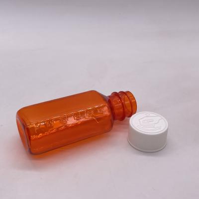 Cina Dosaggio esatto Bottiglia di medicina in plastica 2OZ con tappo a prova di bambino e scala di misura in vendita