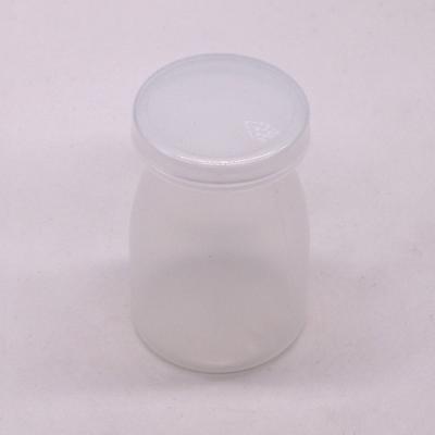 Cina Logo personalizzato Bottiglia rotonda di budino in PP da 100 ml Perfetta per latte e alta temperatura in vendita