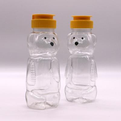 Cina 200ml PET Bear Plastic Honey Jars per alimenti e bottiglia creativa portatile per studenti in vendita