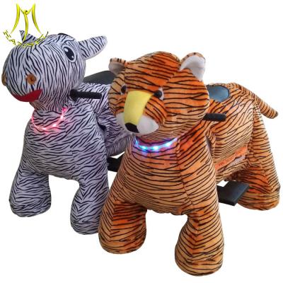 China Hansel electronic game walking coin operated motorized plush riding animals for sale