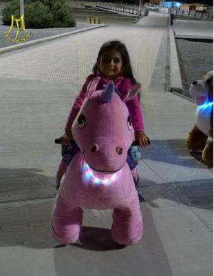 China Hansel  4 wheel plush rocking horse coin game machin pony toys zoo animal scooter for park for sale