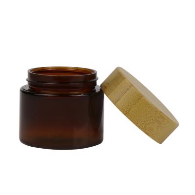 Cina Recipiente di plastica cosmetico vuoto del barattolo 50g 100g della crema dell'ANIMALE DOMESTICO con il coperchio di legno in vendita