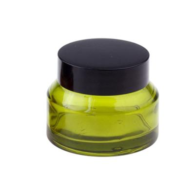 Cina Barattoli di vetro chiara Olive Green Glass Cylinder Jars della crema di fronte IS09001 con i coperchi in vendita