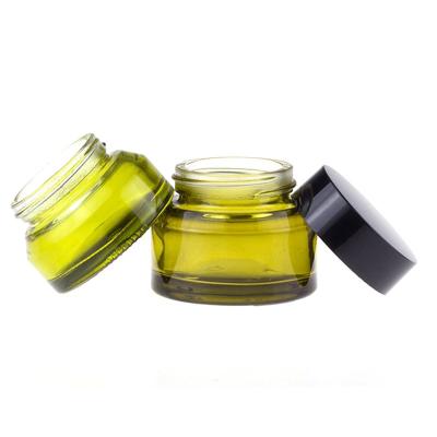 Cina Barattoli di vetro chiara Olive Green Glass Cylinder Jars della crema di fronte IS09001 con i coperchi in vendita