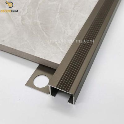 China 10mm Metal Stair Nose Tile Edging Trim Anodized Matt Bronze Color for sale