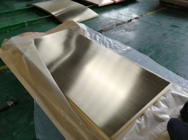Mirror finish brass plate sheet roll showing reflective surface