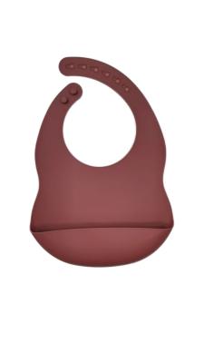 China ODM Red Amamentação Bebê Nutrição Bib Silicone Bib Com Food Catcher à venda