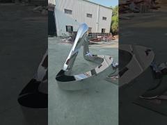 This abstract streamlined stainless steel sculpture adopts top-level mirror polishing