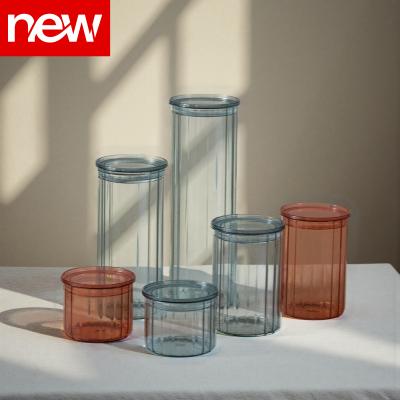 China 500ml 1000ml 1500ml Color Sprayed Stripe Glass Canister with Food-Grade PS Plastic Lid for sale